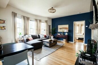 living room with blue feature wall